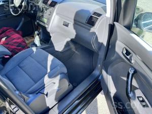 Black Volkswagen Touran 2006 in Daugavpils, with an engine capacity of 1.90 L and mileage of 287 thousand km for 2649 €, photo 16 on AUTOMOTO.COM.LV