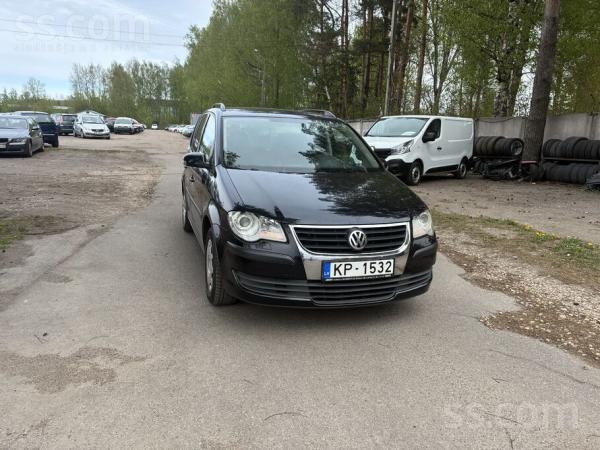 Melns Volkswagen Touran 2006 Rīga, ar dzinēja tilpumu 1.90 L un nobraukumu 0 tūkst. km par 1990 €, foto 1 vietnē AUTOMOTO.COM.LV