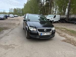 Black Volkswagen Touran 2006 in Riga, with an engine capacity of 1.90 L and mileage of 0 thousand km for 1990 €, photo  on AUTOMOTO.COM.LV