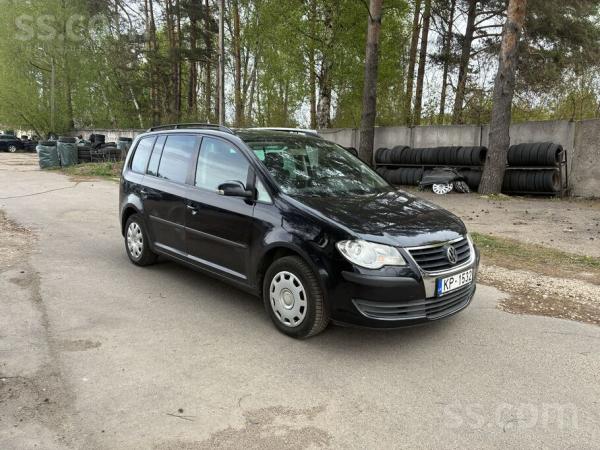Melns Volkswagen Touran 2006 Rīga, ar dzinēja tilpumu 1.90 L un nobraukumu 0 tūkst. km par 1990 €, foto 2 vietnē AUTOMOTO.COM.LV