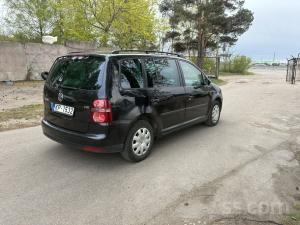 Black Volkswagen Touran 2006 in Riga, with an engine capacity of 1.90 L and mileage of 0 thousand km for 1990 €, photo 4 on AUTOMOTO.COM.LV