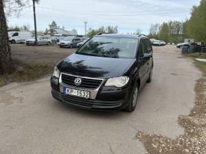 Black Volkswagen Touran 2006 in Riga, with an engine capacity of 1.90 L and mileage of 0 thousand km for 1990 €, photo 6 on AUTOMOTO.COM.LV