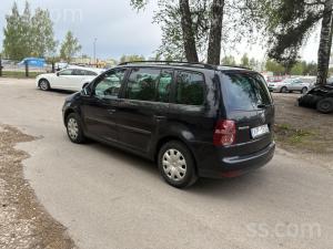 Black Volkswagen Touran 2006 in Riga, with an engine capacity of 1.90 L and mileage of 0 thousand km for 1990 €, photo 8 on AUTOMOTO.COM.LV