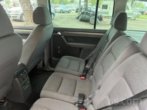 Black Volkswagen Touran 2006 in Riga, with an engine capacity of 1.90 L and mileage of 0 thousand km for 1990 €, photo 11 on AUTOMOTO.COM.LV
