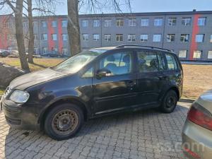 Melns Volkswagen Touran 2006 Rīga, ar dzinēja tilpumu 1.90 L un nobraukumu 264 tūkst. km par 1350 €, foto 3 vietnē AUTOMOTO.COM.LV