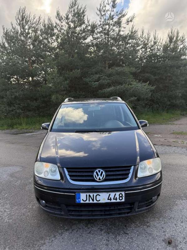 Black Volkswagen Touran 2006 in Kaunas, with an engine capacity of 1.90 L and mileage of 420 thousand km for 1450 €, photo 2 on AUTOMOTO.COM.LV