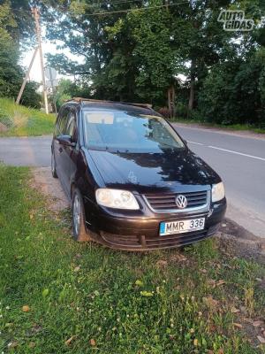Melns Volkswagen Touran 2006 Kauņa, ar dzinēja tilpumu 1.90 L un nobraukumu 305 tūkst. km par 600 €, foto  vietnē AUTOMOTO.COM.LV