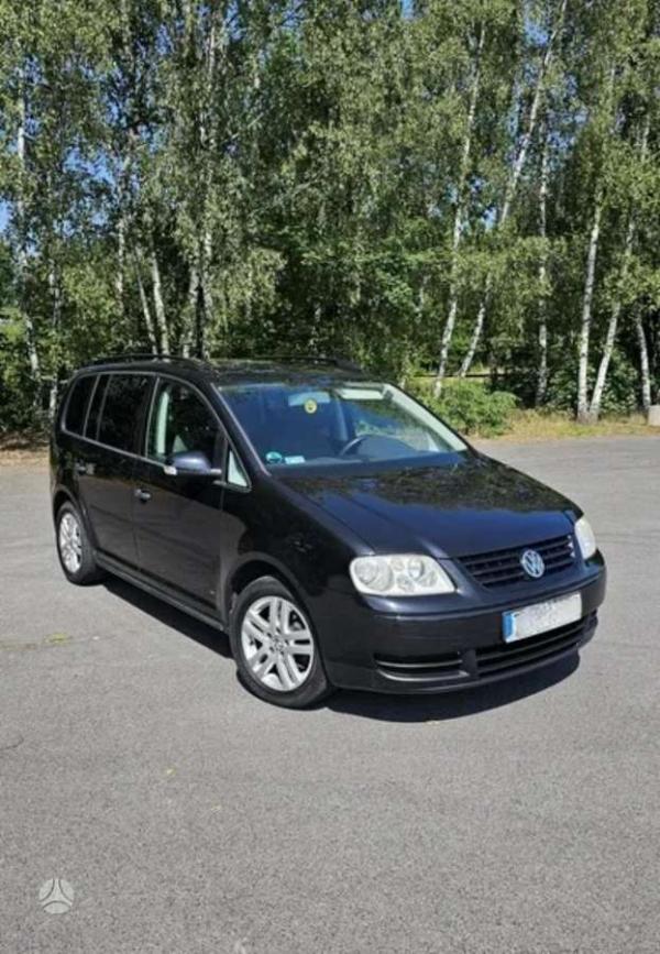 Black Volkswagen Touran 2006 in Vilnius, with an engine capacity of 1.90 L and mileage of 290 thousand km for 1500 €, photo 1 on AUTOMOTO.COM.LV