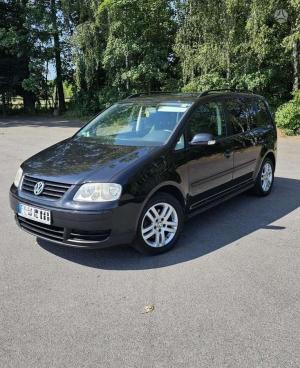 Black Volkswagen Touran 2006 in Vilnius, with an engine capacity of 1.90 L and mileage of 290 thousand km for 1500 €, photo 3 on AUTOMOTO.COM.LV