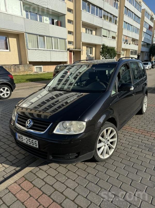 Melns Volkswagen Touran 2006 Rīga, ar dzinēja tilpumu 2.00 L un nobraukumu 269 tūkst. km par 2300 €, foto 1 vietnē AUTOMOTO.COM.LV