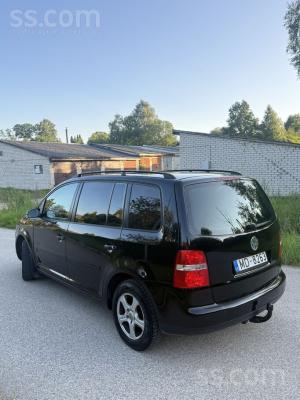 Melns Volkswagen Touran 2006 Kuldīga, ar dzinēja tilpumu 1.90 L un nobraukumu 349 tūkst. km par 1600 €, foto 3 vietnē AUTOMOTO.COM.LV