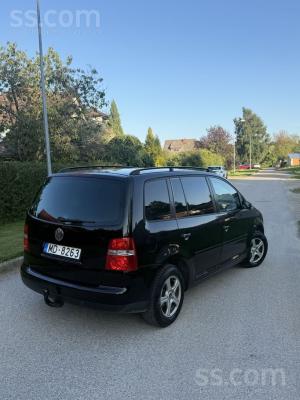 Melns Volkswagen Touran 2006 Kuldīga, ar dzinēja tilpumu 1.90 L un nobraukumu 349 tūkst. km par 1600 €, foto 5 vietnē AUTOMOTO.COM.LV
