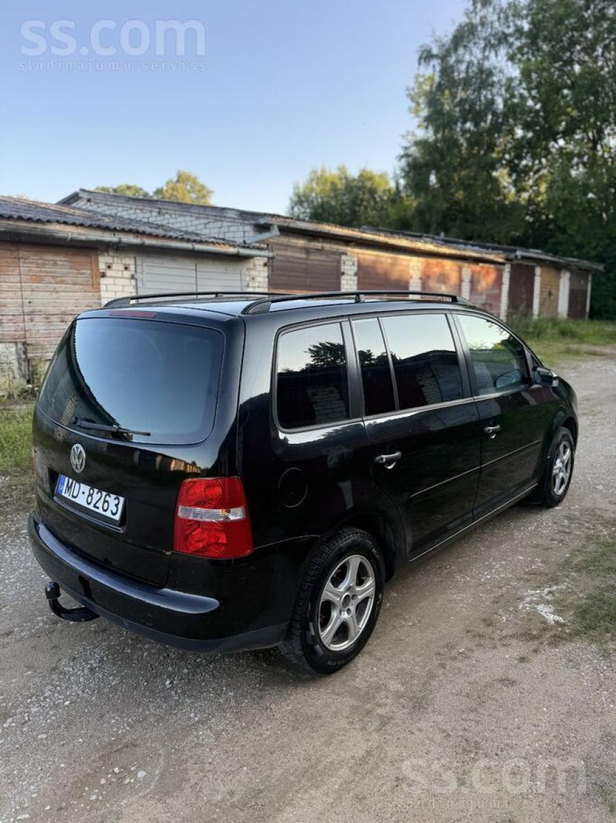 Melns Volkswagen Touran 2006 Kuldīga, ar dzinēja tilpumu 1.90 L un nobraukumu 349 tūkst. km par 1600 €, foto 7 vietnē AUTOMOTO.COM.LV