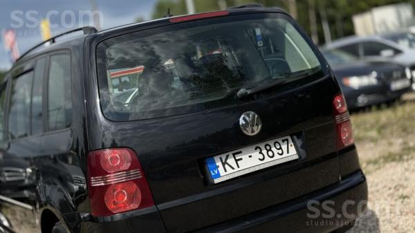 Black Volkswagen Touran 2006 in Jelgava, with an engine capacity of 2.00 L and mileage of 300 thousand km for 2290 €, photo 6 on AUTOMOTO.COM.LV