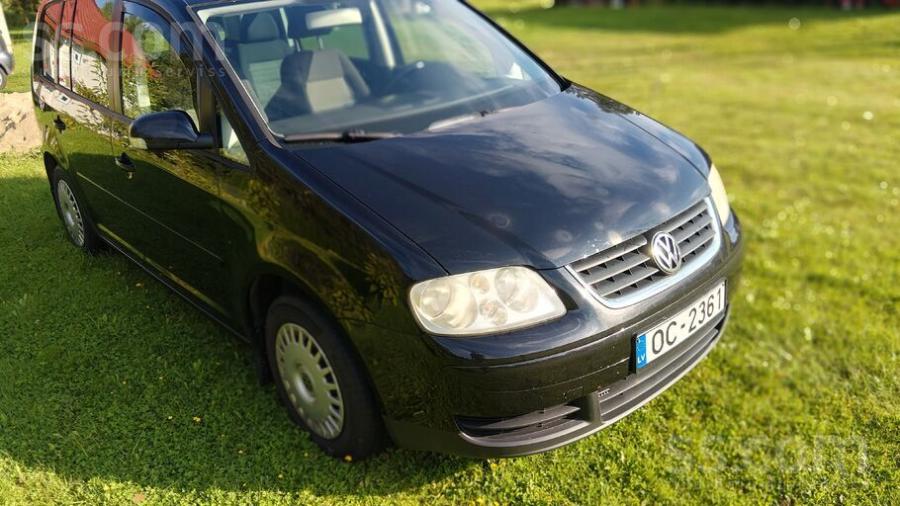 Black Volkswagen Touran 2006 in Ogre, with an engine capacity of 1.90 L and mileage of 360 thousand km for 2450 €, photo 1 on AUTOMOTO.COM.LV