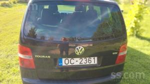 Black Volkswagen Touran 2006 in Ogre, with an engine capacity of 1.90 L and mileage of 360 thousand km for 2450 €, photo 4 on AUTOMOTO.COM.LV