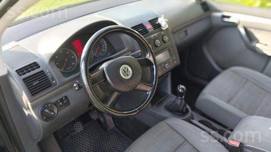 Black Volkswagen Touran 2006 in Ogre, with an engine capacity of 1.90 L and mileage of 360 thousand km for 2450 €, photo 6 on AUTOMOTO.COM.LV