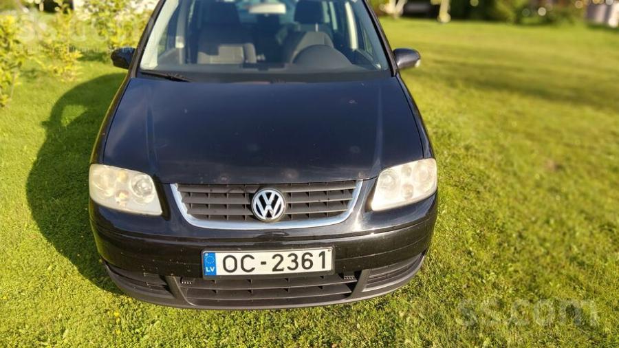 Black Volkswagen Touran 2006 in Ogre, with an engine capacity of 1.90 L and mileage of 360 thousand km for 2450 €, photo 7 on AUTOMOTO.COM.LV