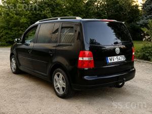 Melns Volkswagen Touran 2006 Rīga, ar dzinēja tilpumu 2.00 L un nobraukumu 434 tūkst. km par 990 €, foto 5 vietnē AUTOMOTO.COM.LV