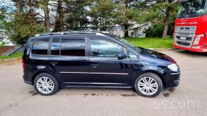 Black Volkswagen Touran 2007 in Cesis, with an engine capacity of 2.00 L and mileage of 366 thousand km for 1950 €, photo 4 on AUTOMOTO.COM.LV