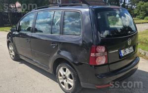 Melns Volkswagen Touran 2007 Rīga, ar dzinēja tilpumu 2.00 L un nobraukumu 356 tūkst. km par 1100 €, foto 4 vietnē AUTOMOTO.COM.LV