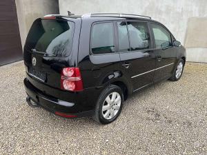 Black Volkswagen Touran 2007 in Kedainiai, with an engine capacity of 0.00 L and mileage of 285 thousand km for 3999 €, photo 6 on AUTOMOTO.COM.LV