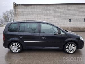 Melns Volkswagen Touran 2007 Ogre, ar dzinēja tilpumu 2.00 L un nobraukumu 367 tūkst. km par 1300 €, foto  vietnē AUTOMOTO.COM.LV
