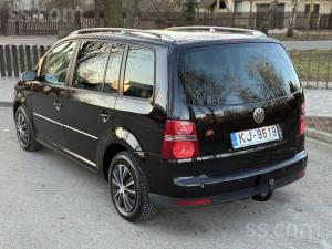 Melns Volkswagen Touran 2007 Rīga, ar dzinēja tilpumu 2.00 L un nobraukumu 346 tūkst. km par 1950 €, foto 3 vietnē AUTOMOTO.COM.LV
