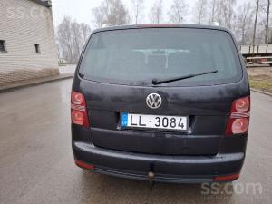 Black Volkswagen Touran 2007 in Ogre, with an engine capacity of 2.00 L and mileage of 367 thousand km for 1000 €, photo 4 on AUTOMOTO.COM.LV