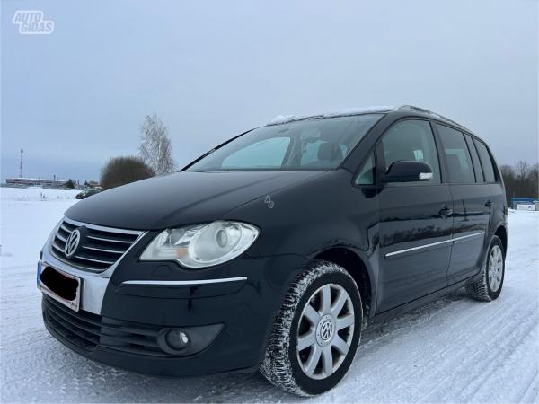 Black Volkswagen Touran 2007 in Kaunas, with an engine capacity of 2.00 L and mileage of 319 thousand km for 2200 €, photo 1 on AUTOMOTO.COM.LV