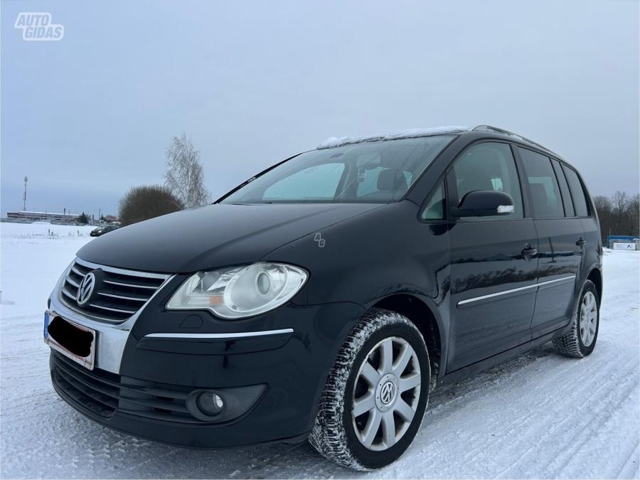 Black Volkswagen Touran 2007 in Kaunas, with an engine capacity of 2.00 L and mileage of 319 thousand km for 2200 €, photo 1 on AUTOMOTO.COM.LV