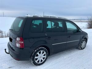 Black Volkswagen Touran 2007 in Kaunas, with an engine capacity of 2.00 L and mileage of 319 thousand km for 2200 €, photo 2 on AUTOMOTO.COM.LV