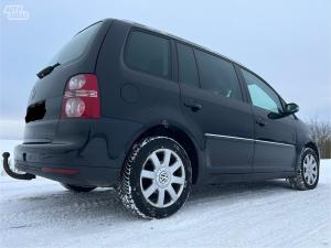 Black Volkswagen Touran 2007 in Kaunas, with an engine capacity of 2.00 L and mileage of 319 thousand km for 2200 €, photo 4 on AUTOMOTO.COM.LV