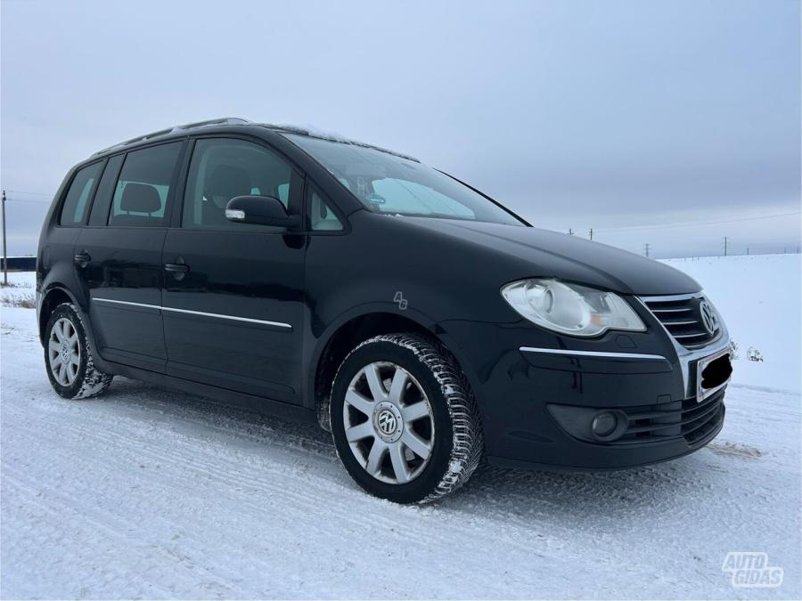 Black Volkswagen Touran 2007 in Kaunas, with an engine capacity of 2.00 L and mileage of 319 thousand km for 2200 €, photo 5 on AUTOMOTO.COM.LV