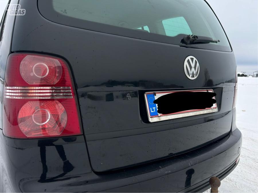 Black Volkswagen Touran 2007 in Kaunas, with an engine capacity of 2.00 L and mileage of 319 thousand km for 2200 €, photo 6 on AUTOMOTO.COM.LV