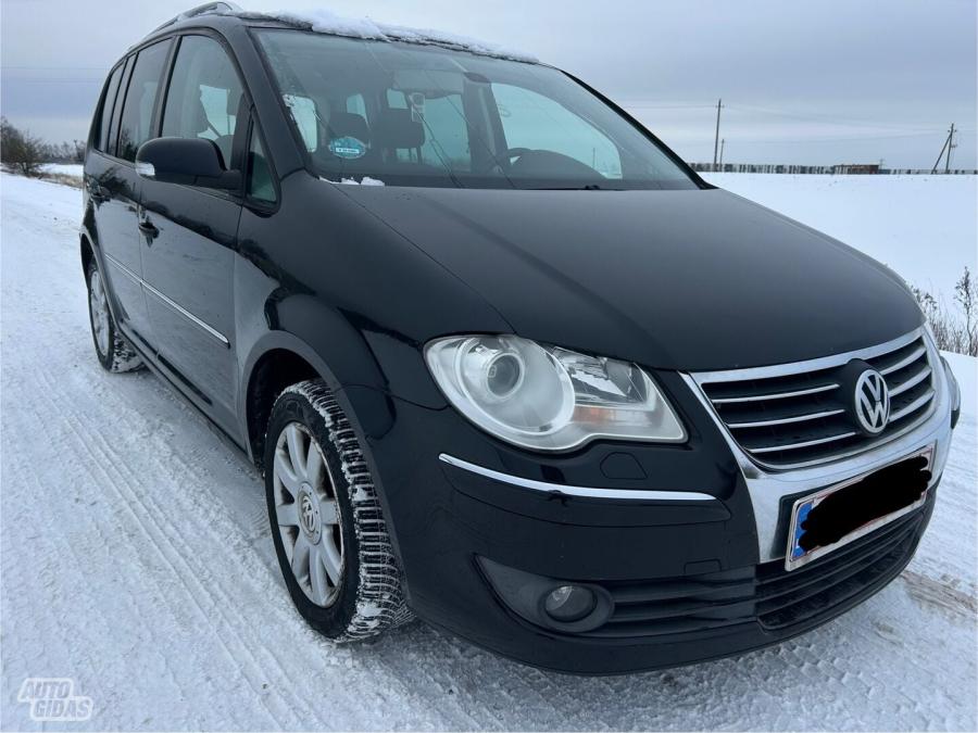 Black Volkswagen Touran 2007 in Kaunas, with an engine capacity of 2.00 L and mileage of 319 thousand km for 2200 €, photo 7 on AUTOMOTO.COM.LV