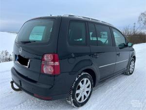 Black Volkswagen Touran 2007 in Kaunas, with an engine capacity of 2.00 L and mileage of 319 thousand km for 2200 €, photo 8 on AUTOMOTO.COM.LV