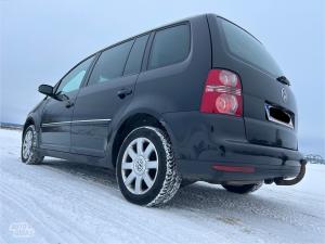 Black Volkswagen Touran 2007 in Kaunas, with an engine capacity of 2.00 L and mileage of 319 thousand km for 2200 €, photo 12 on AUTOMOTO.COM.LV