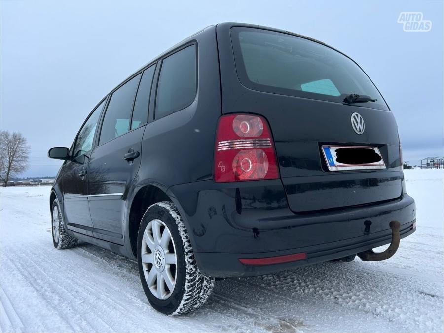 Black Volkswagen Touran 2007 in Kaunas, with an engine capacity of 2.00 L and mileage of 319 thousand km for 2200 €, photo 13 on AUTOMOTO.COM.LV