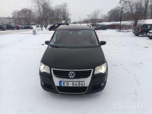 Black Volkswagen Touran 2007 in Jelgava, with an engine capacity of 2.00 L and mileage of 284 thousand km for 2300 €, photo 2 on AUTOMOTO.COM.LV