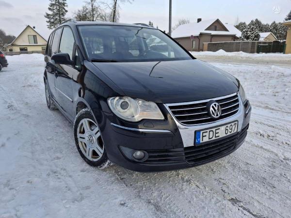 Black Volkswagen Touran 2007 in Utena, with an engine capacity of 1.97 L and mileage of 305 thousand km for 2650 €, photo 4 on AUTOMOTO.COM.LV