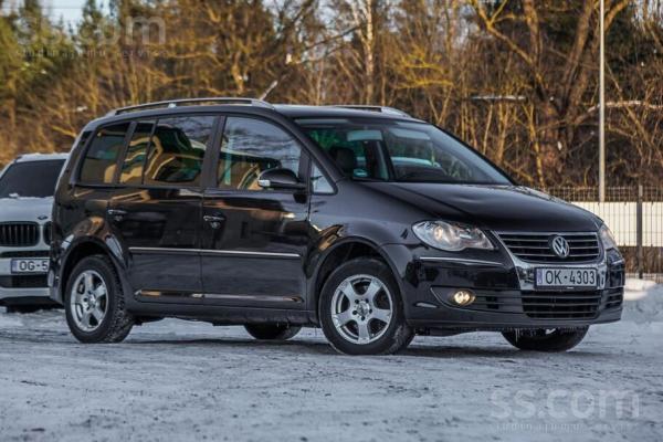 Melns Volkswagen Touran 2007 Rīga, ar dzinēja tilpumu 1.40 L un nobraukumu 238 tūkst. km par 3990 €, foto 2 vietnē AUTOMOTO.COM.LV