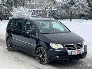 Black Volkswagen Touran 2007 in Kedainiai, with an engine capacity of 1.97 L and mileage of 263 thousand km for 3999 €, photo  on AUTOMOTO.COM.LV