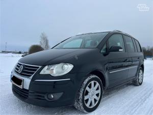 Black Volkswagen Touran 2007 in Kaunas, with an engine capacity of 2.00 L and mileage of 319 thousand km for 2450 €, photo  on AUTOMOTO.COM.LV