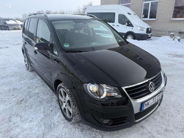 Melns Volkswagen Touran 2007 Marijampole, ar dzinēja tilpumu 1.97 L un nobraukumu 280 tūkst. km par 3500 €, foto 5 vietnē AUTOMOTO.COM.LV
