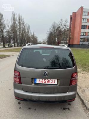 Black Volkswagen Touran 2007 in Klaipeda, with an engine capacity of 2.00 L and mileage of 313 thousand km for 1350 €, photo 4 on AUTOMOTO.COM.LV