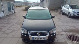 Black Volkswagen Touran 2007 in Vilnius, with an engine capacity of 2.00 L and mileage of 251 thousand km for 4550 €, photo  on AUTOMOTO.COM.LV