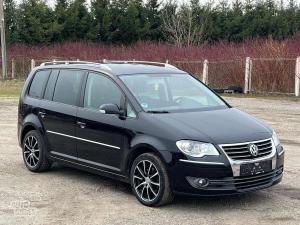 Melns Volkswagen Touran 2007 Kėdainiai, ar dzinēja tilpumu 2.00 L un nobraukumu 263 tūkst. km par 3899 €, foto  vietnē AUTOMOTO.COM.LV