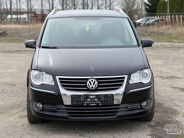 Melns Volkswagen Touran 2007 Kėdainiai, ar dzinēja tilpumu 2.00 L un nobraukumu 263 tūkst. km par 3899 €, foto 7 vietnē AUTOMOTO.COM.LV