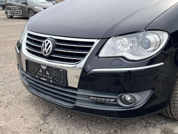 Melns Volkswagen Touran 2007 Kėdainiai, ar dzinēja tilpumu 2.00 L un nobraukumu 263 tūkst. km par 3899 €, foto 8 vietnē AUTOMOTO.COM.LV